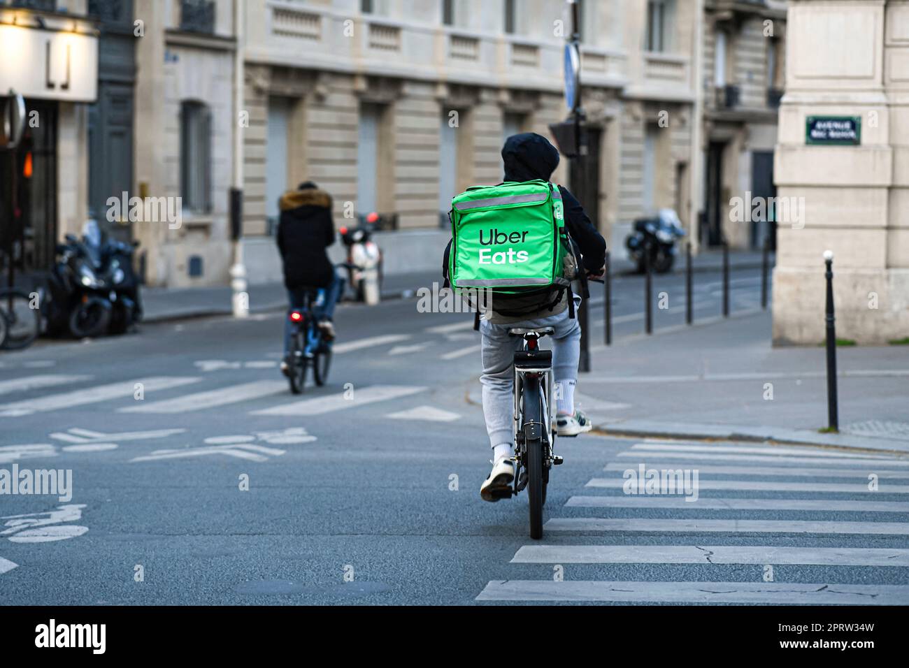 Paris, France. 26th Apr, 2023. A deliver for Uber Eats (UberEats) on his bike (bicycle ...
