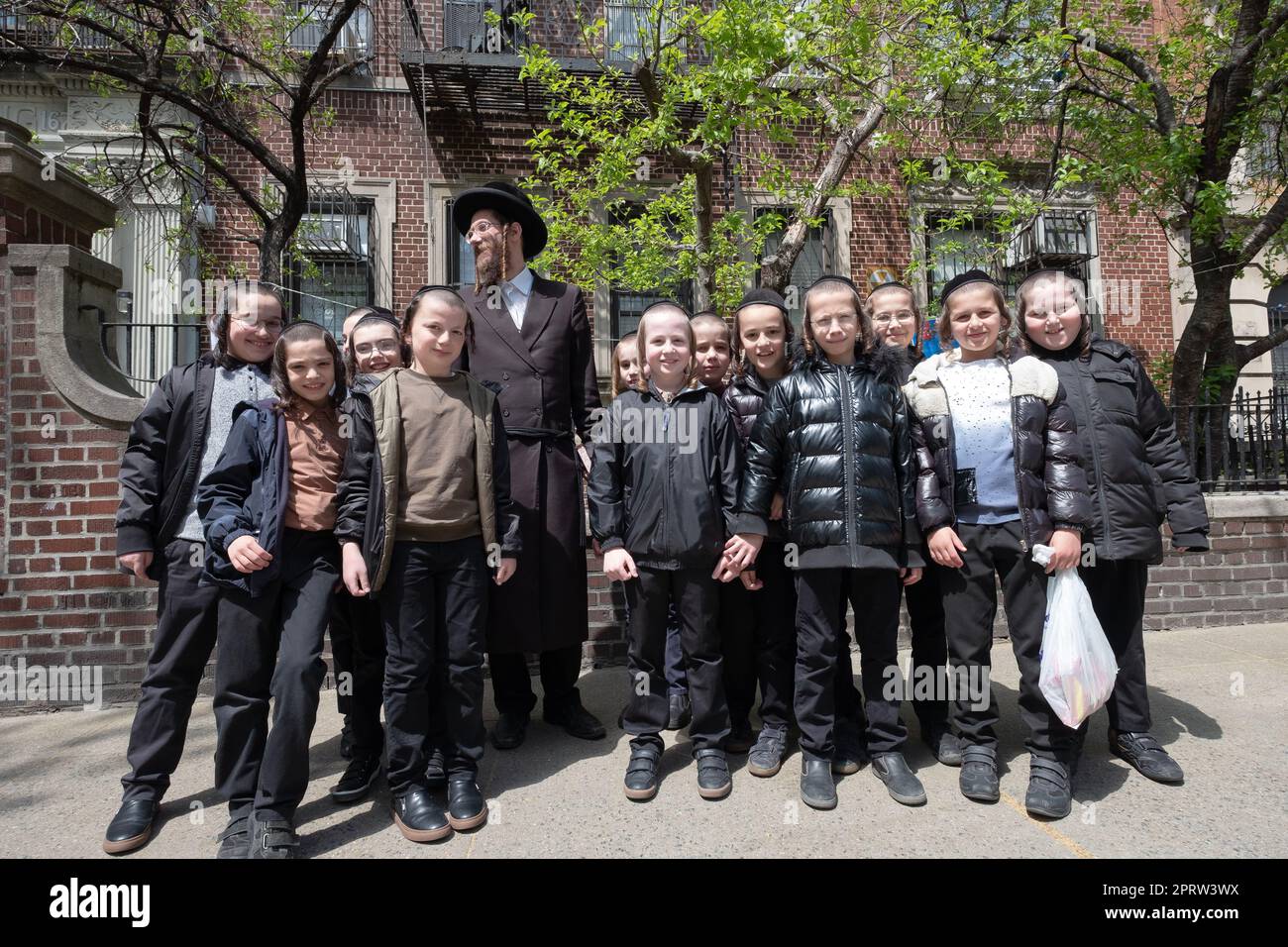 Posed photo of a class of yeshiva students & their rabbi just after the ...