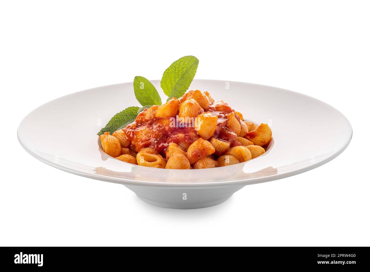 Macaroni pasta with red Bolognese tomato sauce with sage leaves in ...