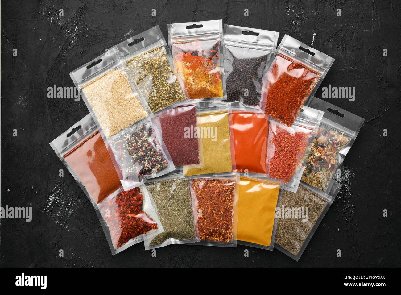 Different spices in plastic package Stock Photo - Alamy