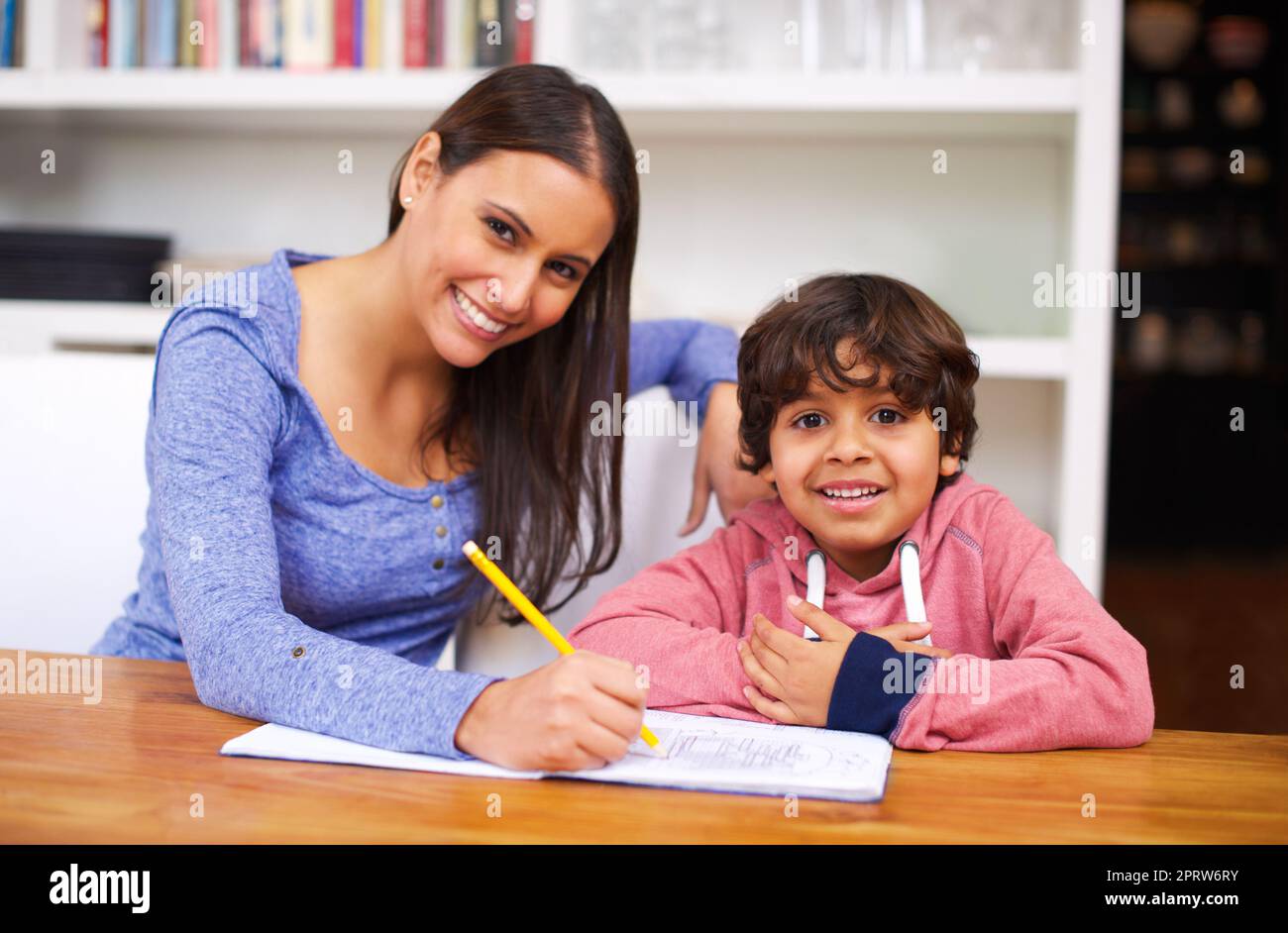 Son helping mother hi-res stock photography and images - Alamy