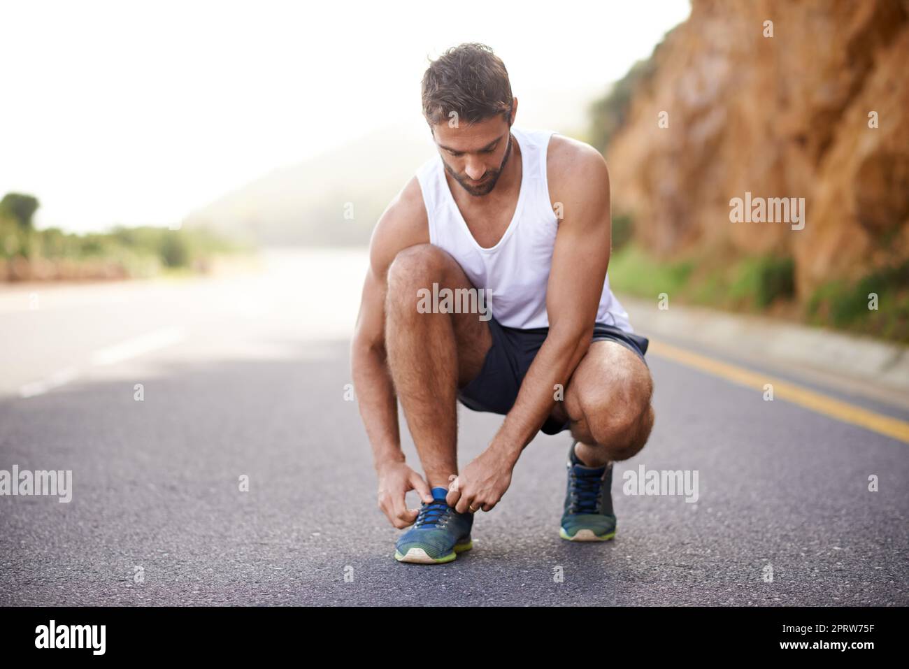 Crouching legs hi-res stock photography and images - Alamy