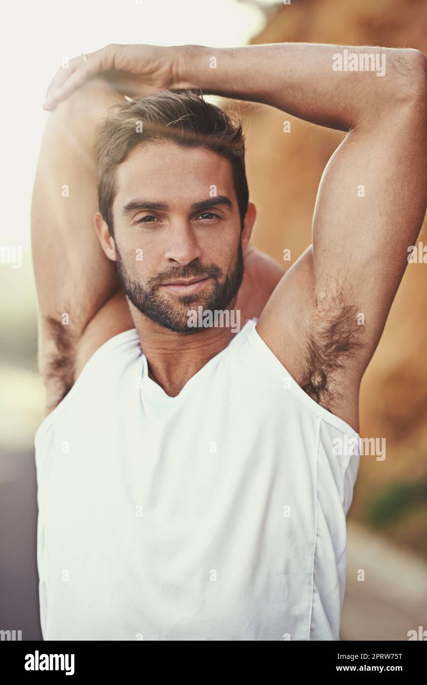 Running is more than exercise, its a way of life. Portrait of a young ...