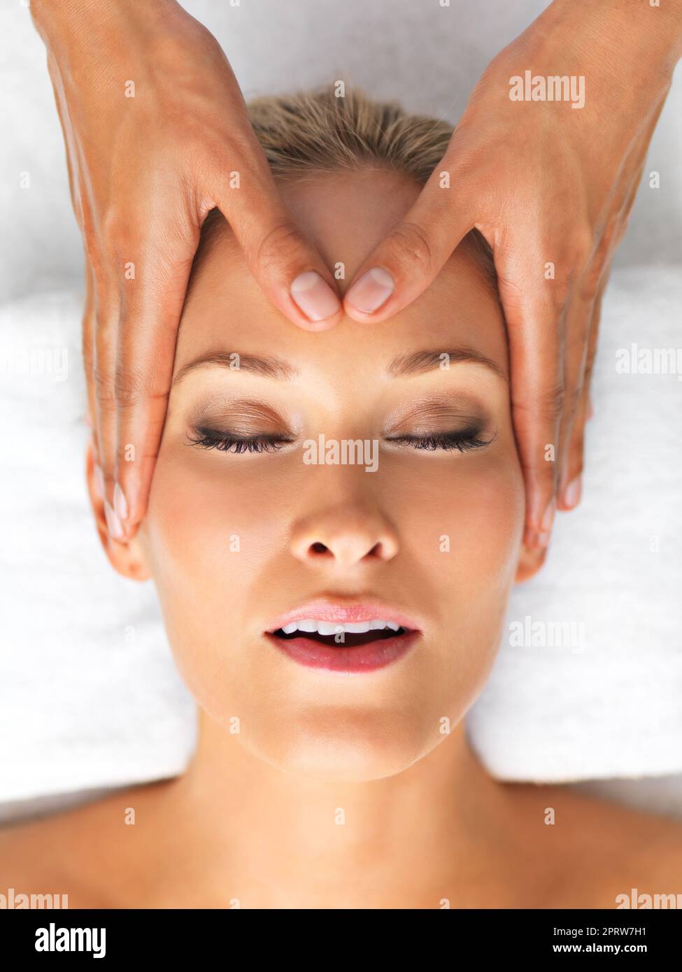 Swept away on a wave of total relaxation. A beautiful young woman ...