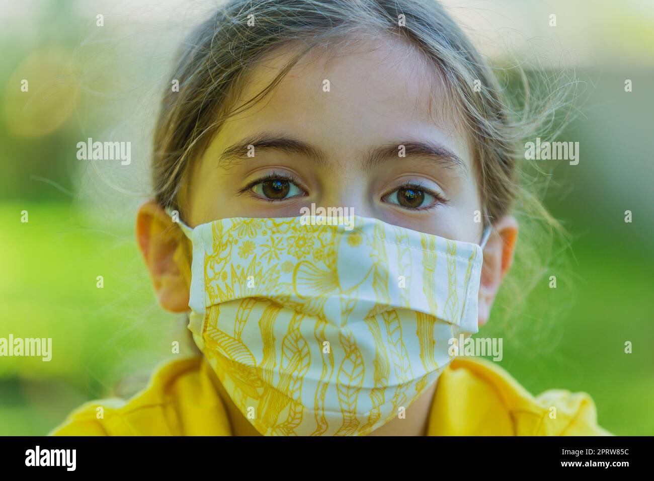 Little girl with mask Stock Photo - Alamy