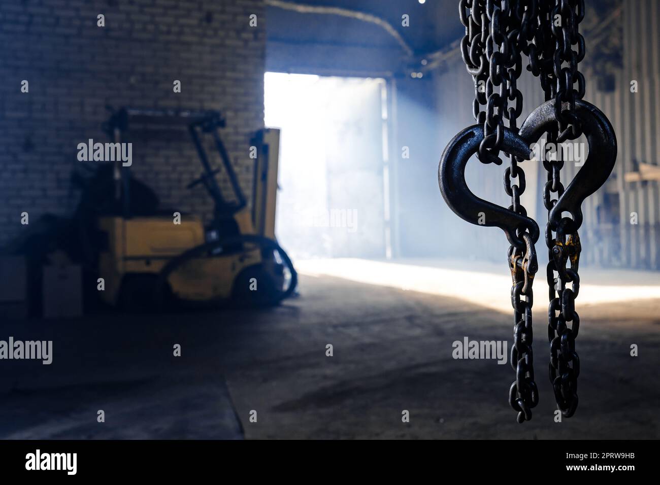 steel chain hook of electric hoist. industrial background Stock Photo ...