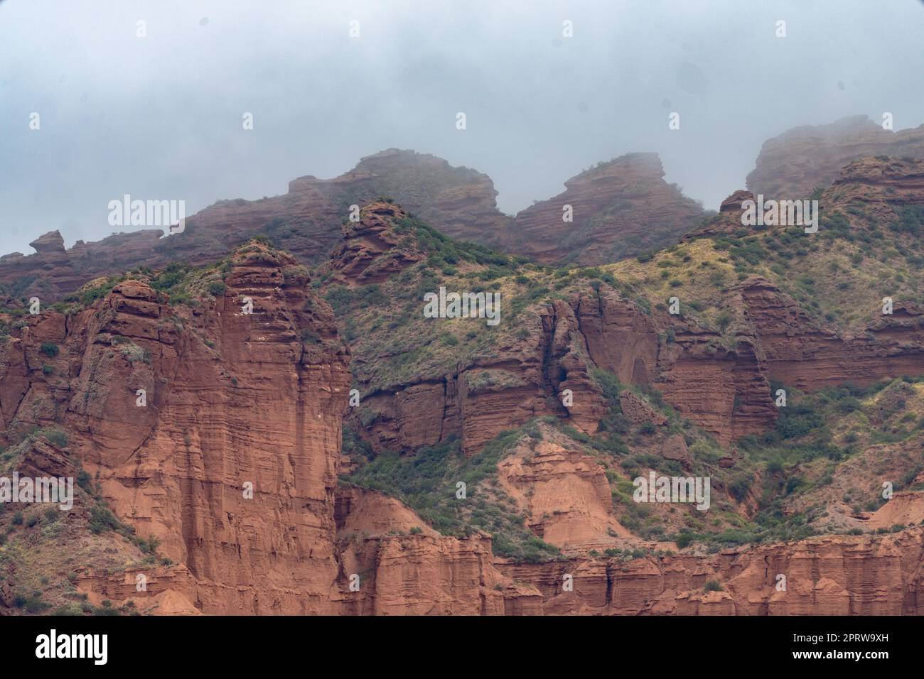 Low clouds over the sandstone cliffs in Sierra de las Quijadas National ...