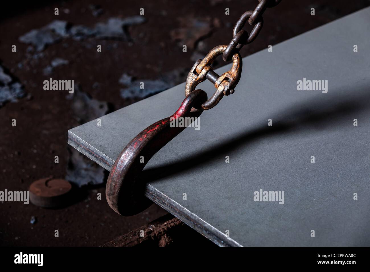Crane chain and hook at an industrial plant. hooks for lifting steel ...