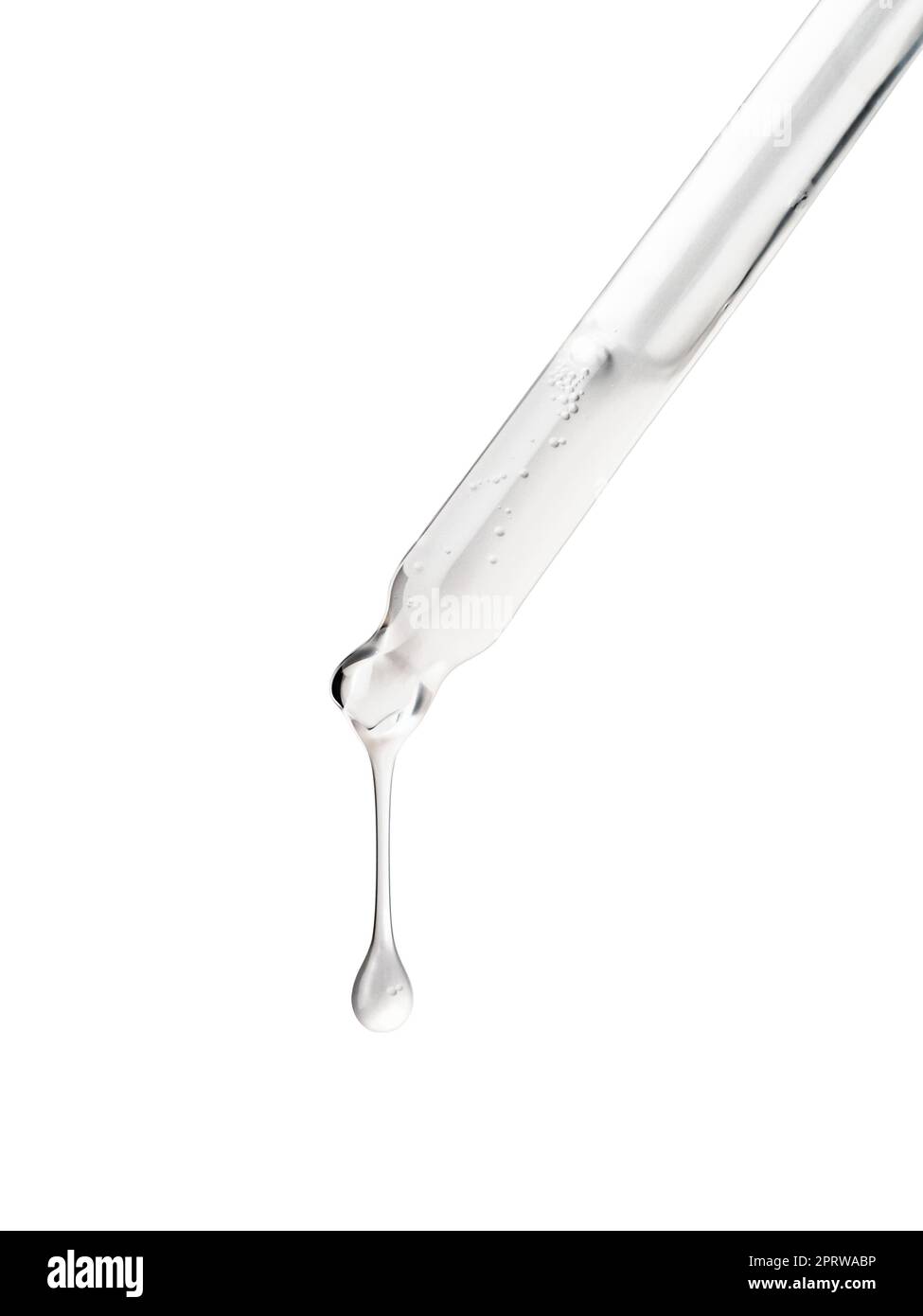 Clear essential serum oil dripping isolated Stock Photo - Alamy