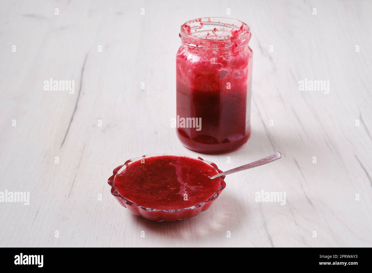 Jar saucer cherry jam hi-res stock photography and images - Alamy