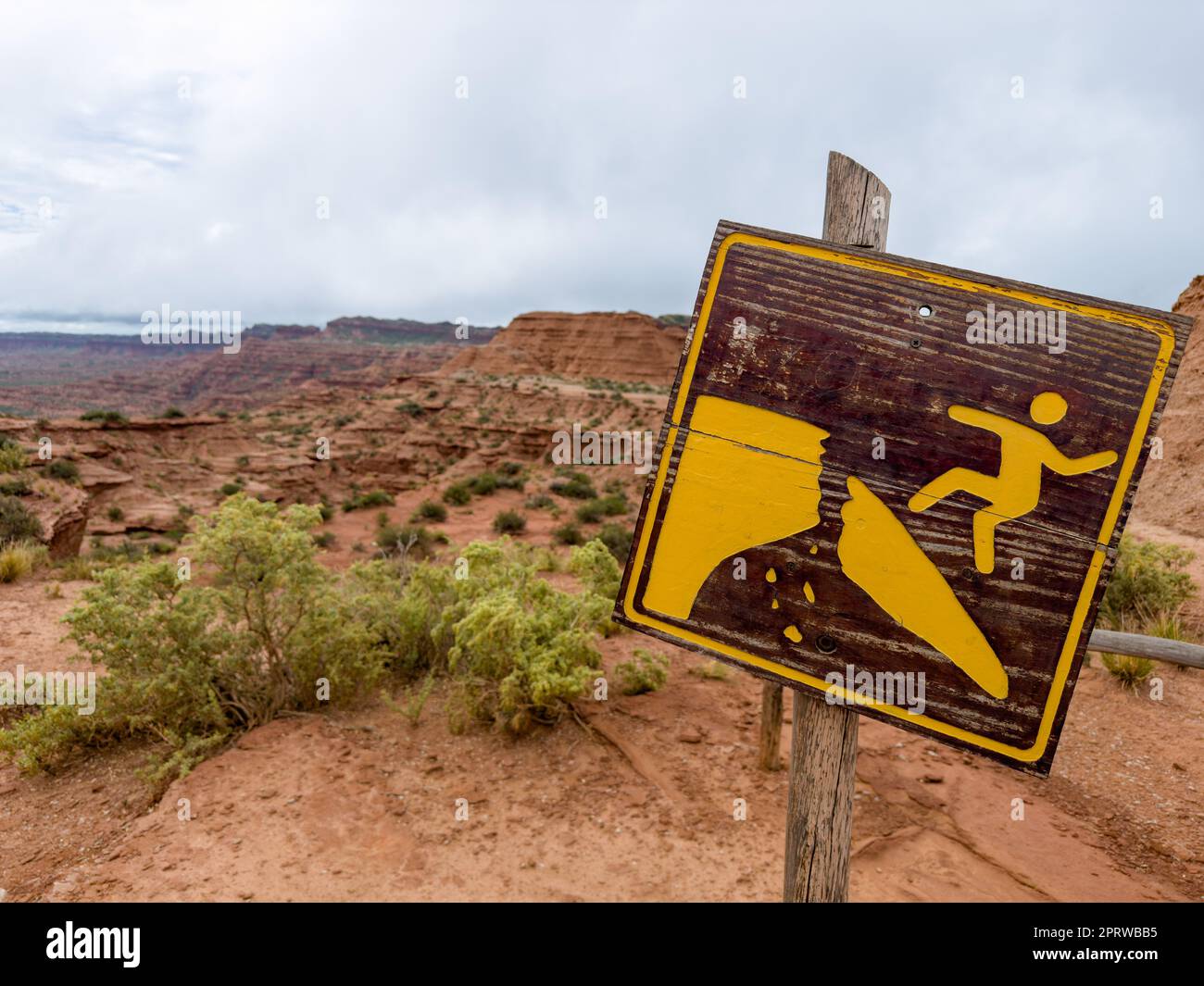 A warning sign to stay of ledges on the cliffs of Sierra de las ...