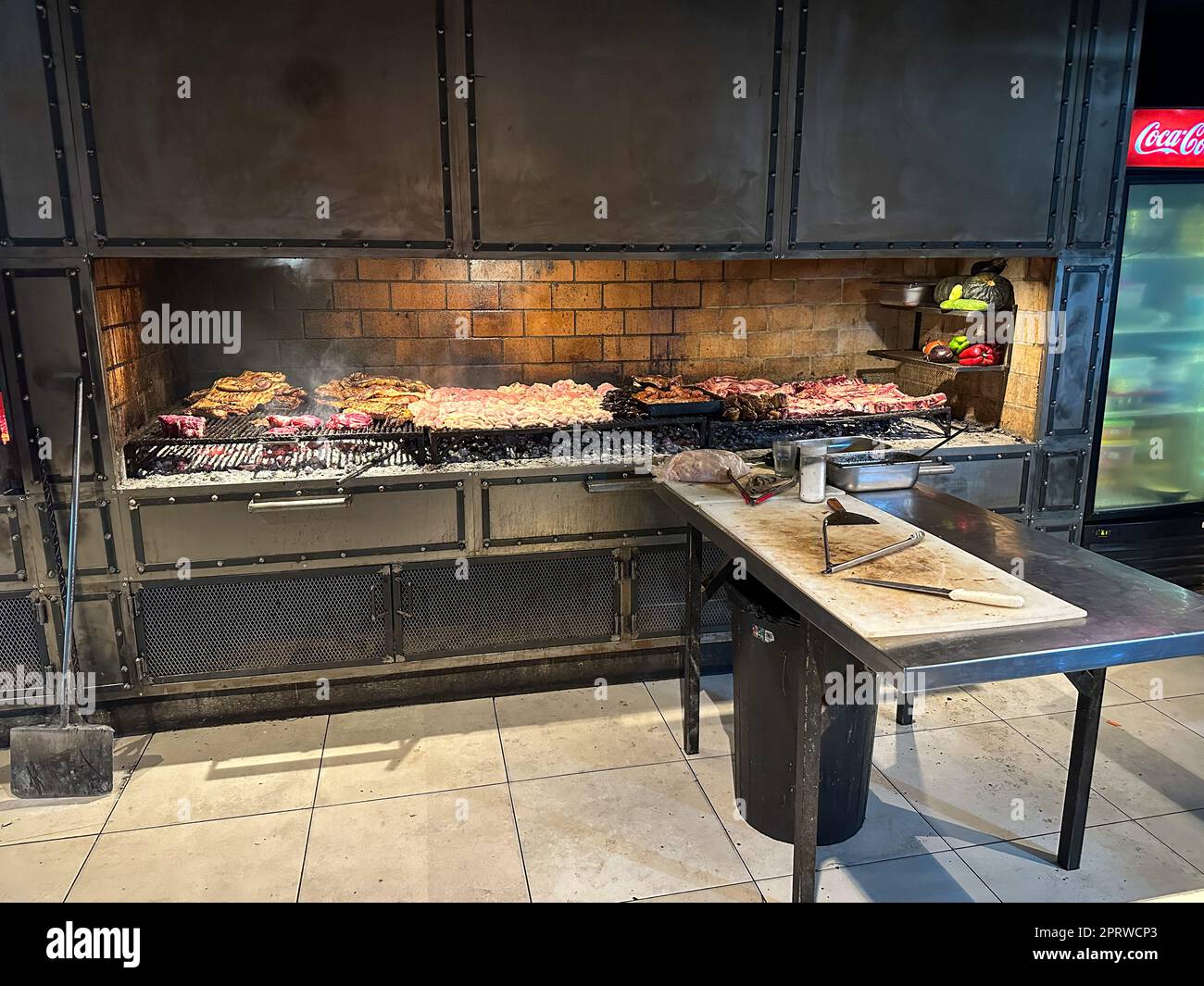 Meat cooking at parrilla restaurant hi-res stock photography and images ...