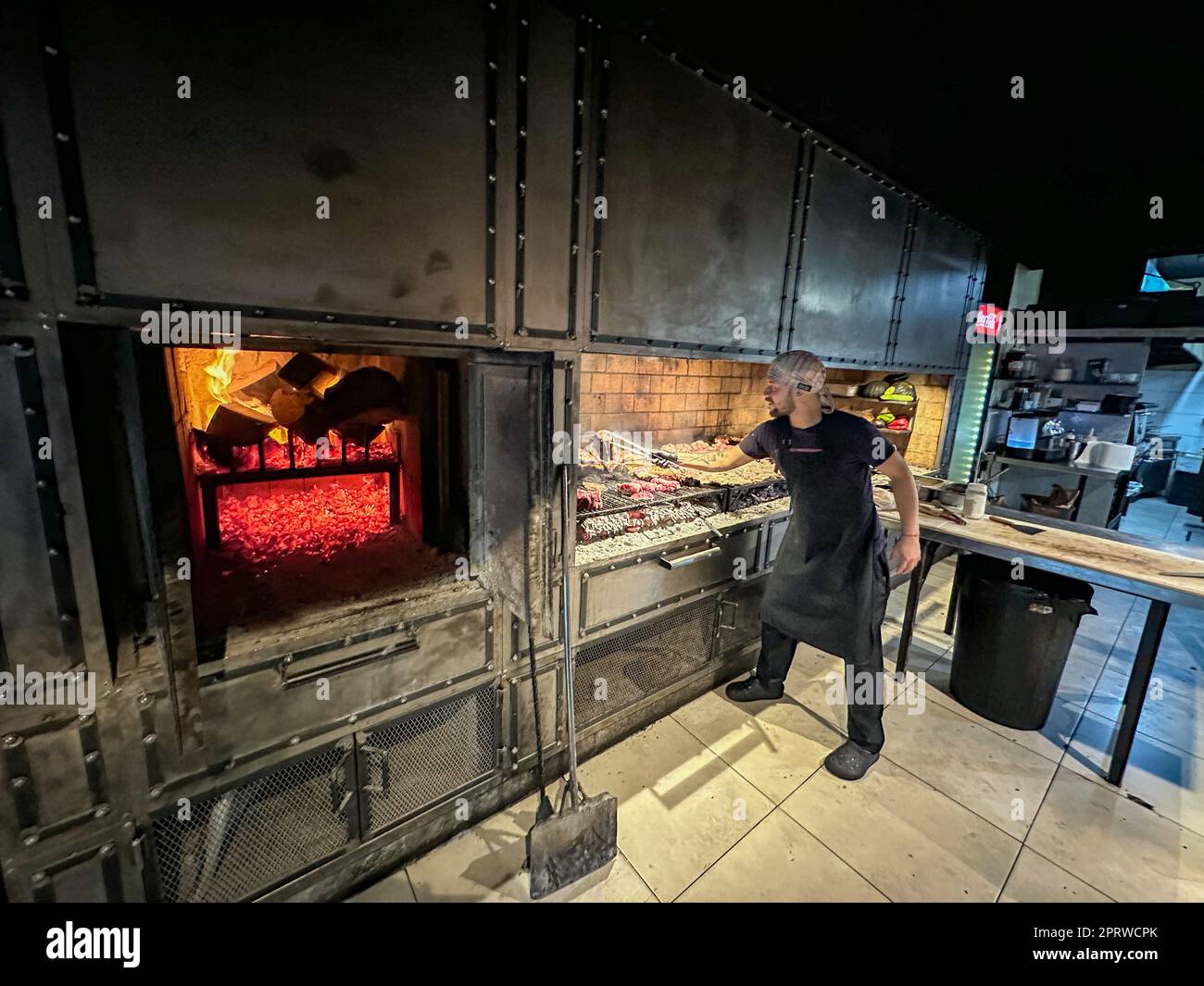 Meat cooking at parrilla restaurant hi-res stock photography and images ...