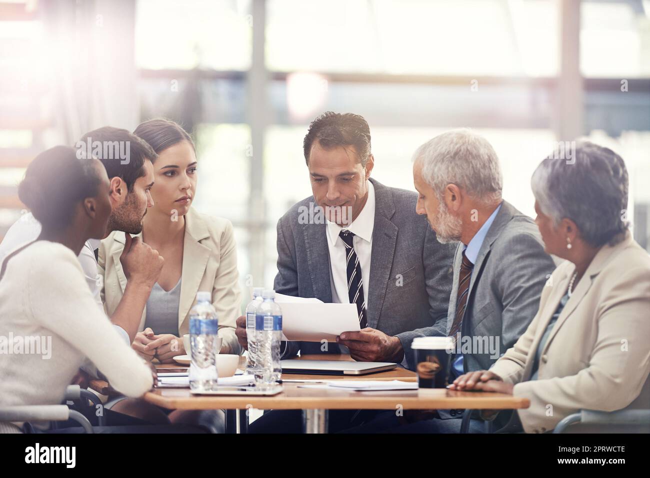 Serious talk in the group hi-res stock photography and images - Alamy