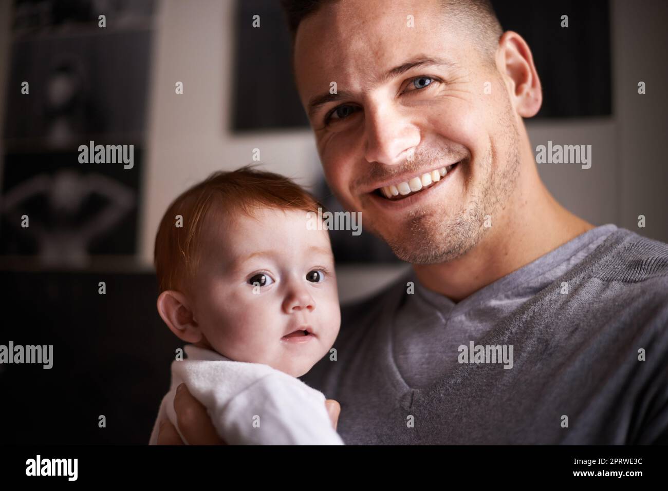 Proud to be her dad. a young father holding his adorable baby girl Stock Photo - Alamy