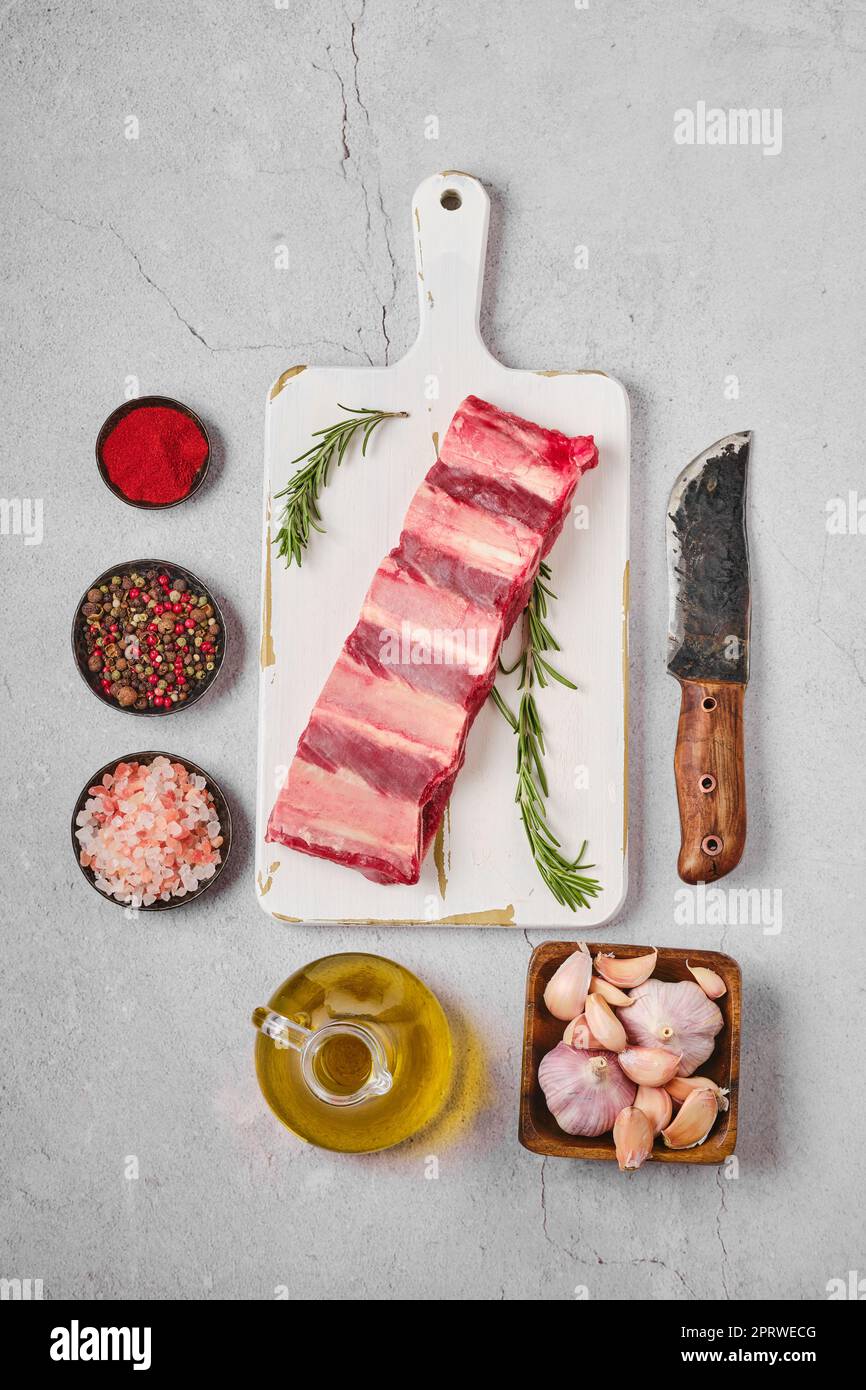Raw fresh beef short ribs on cutting board Stock Photo - Alamy