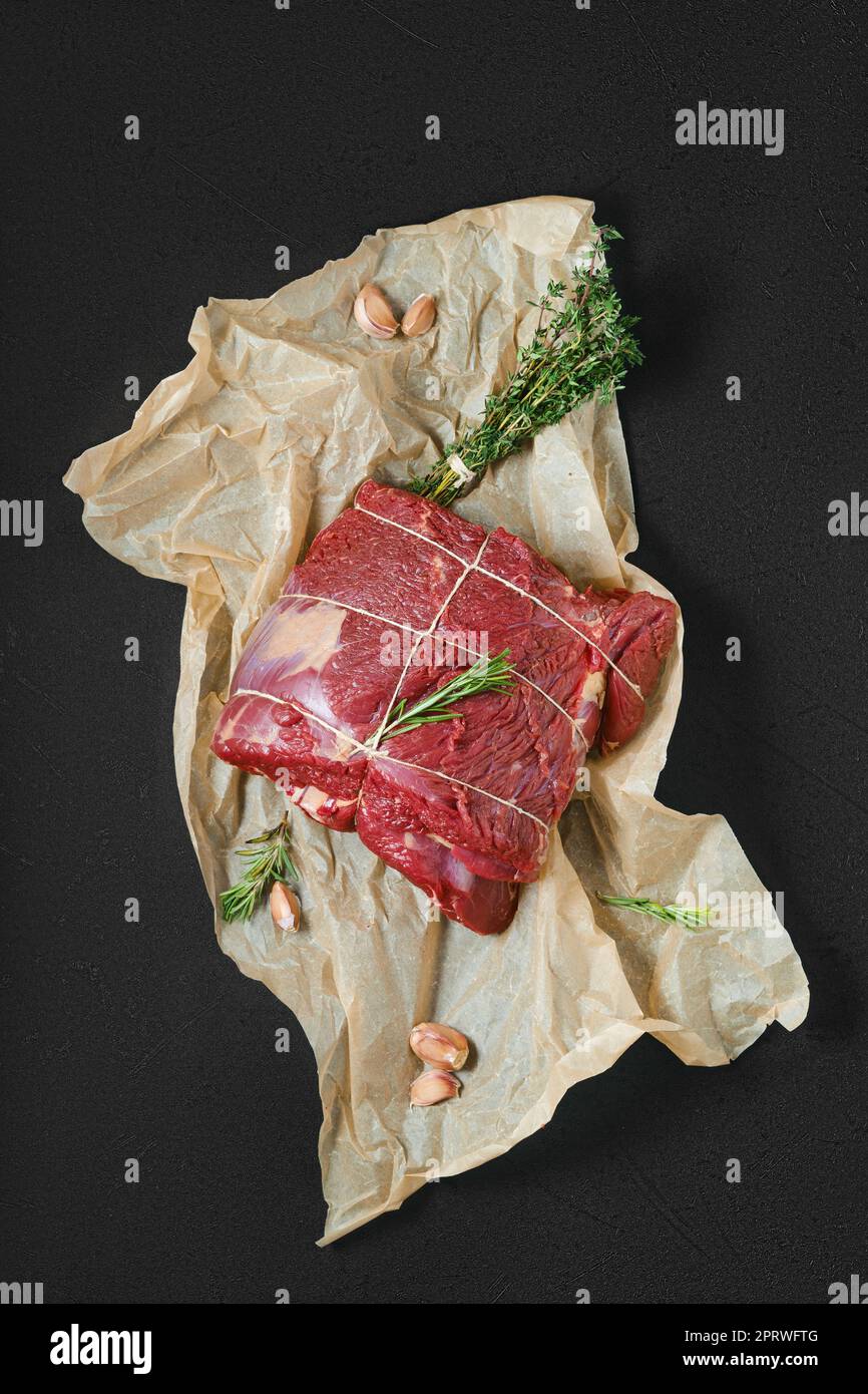 Top view of raw beef neck on wrapping paper Stock Photo - Alamy