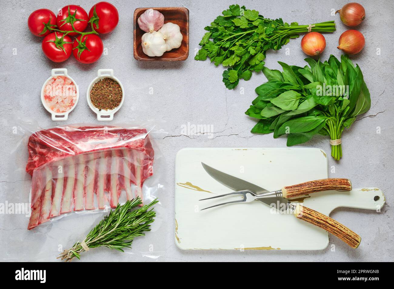 Vacuum sealed rack of lamb with ingredients Stock Photo - Alamy
