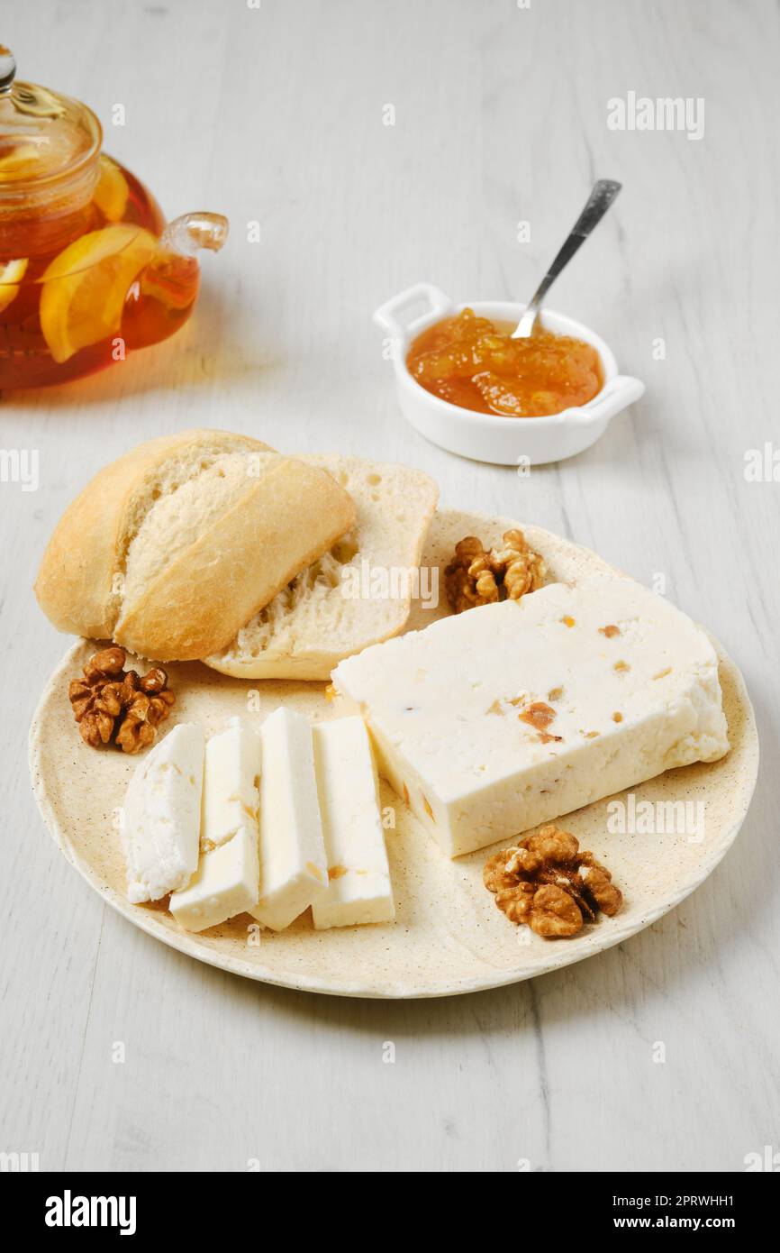 Homemade curd cheese with raisin and walnut Stock Photo - Alamy