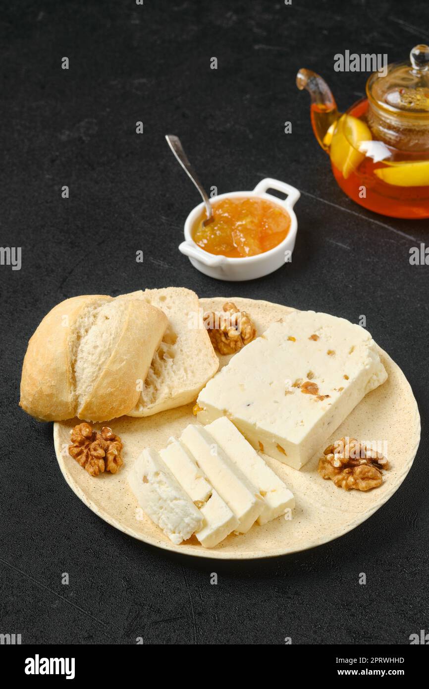 Homemade curd cheese with raisin and walnut Stock Photo - Alamy