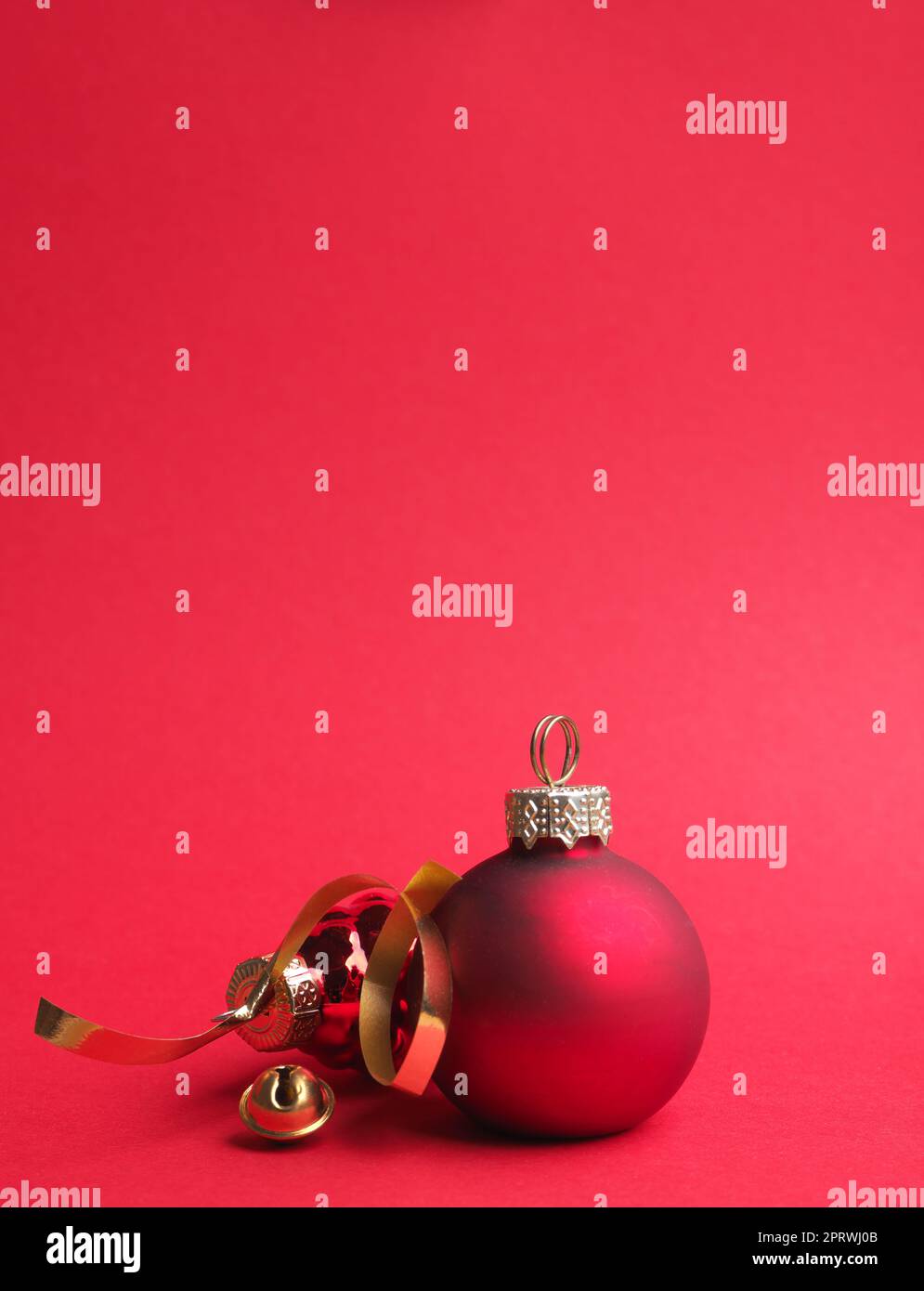 Vintage Christmas baubles on a red background with space for your text ...