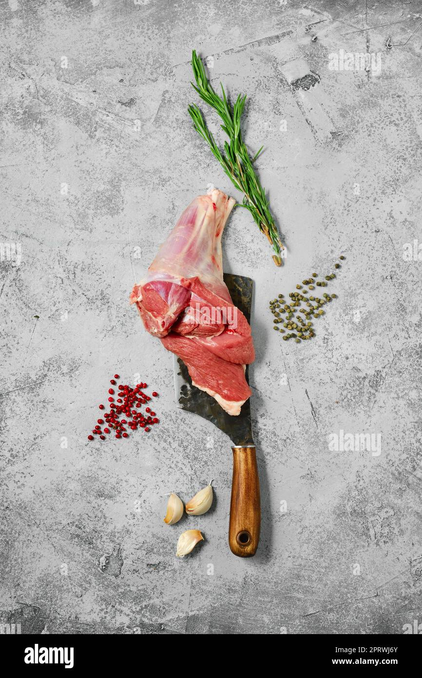 Composition with raw lamb leg, chump off shank Stock Photo - Alamy