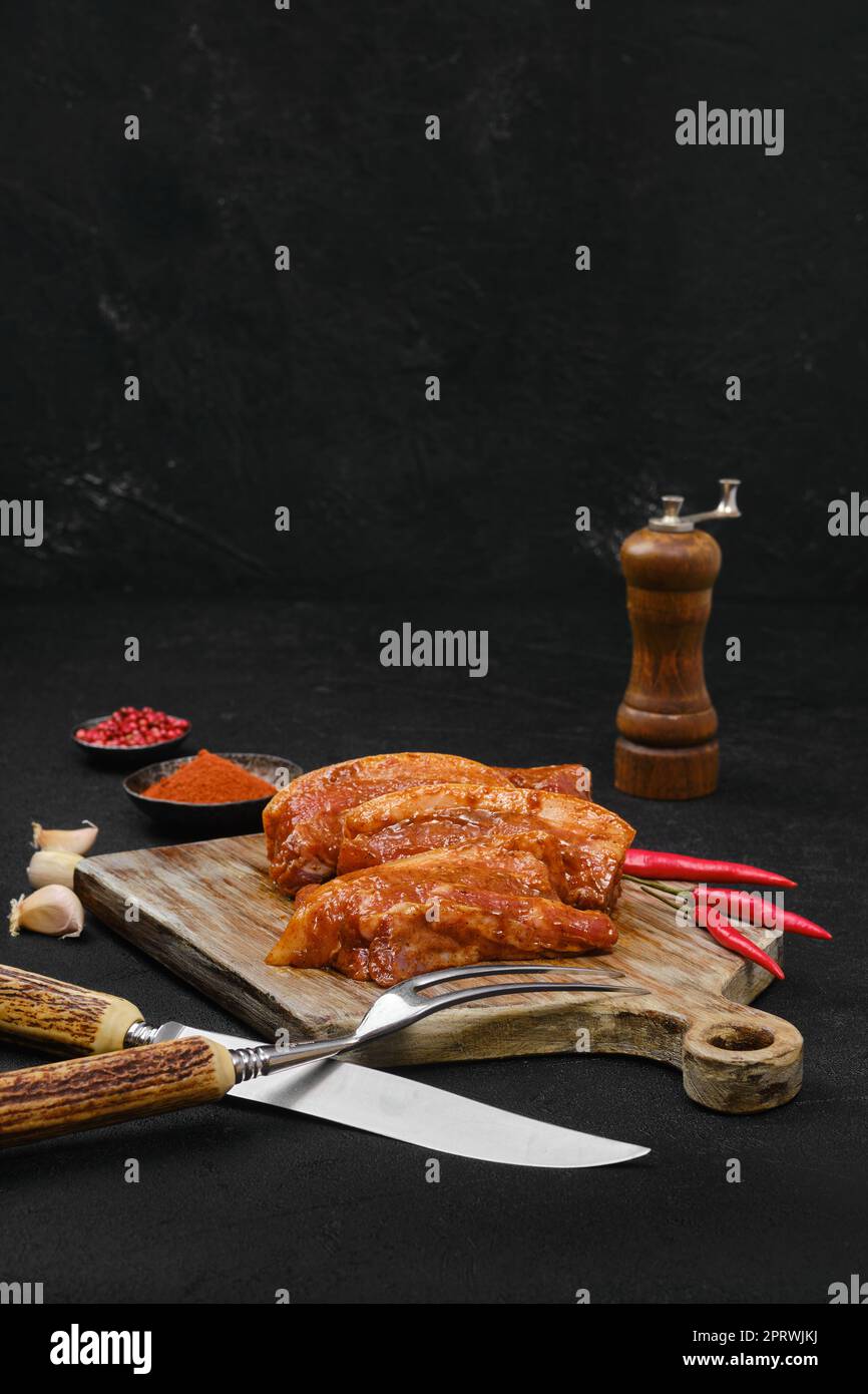 Marinated spicy pork belly slice Stock Photo - Alamy