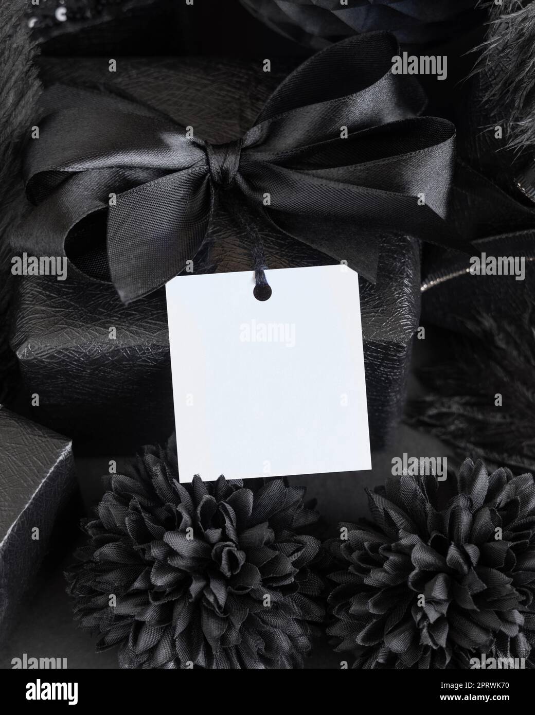 Wrapped Gift Boxes with black paper flowers and decorations and square ...