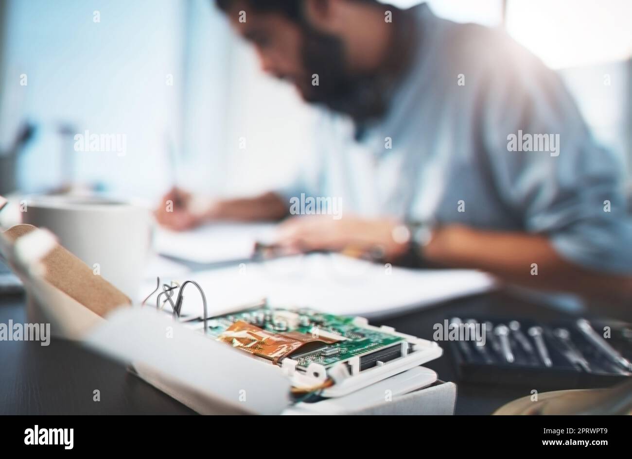 Young male engineer working hi-res stock photography and images - Alamy