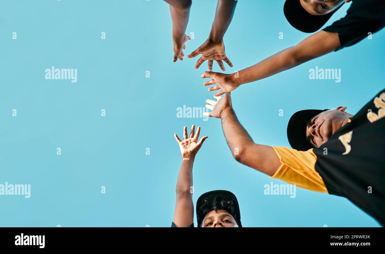 Stacking their hands in a teamwork hi-res stock photography and images ...