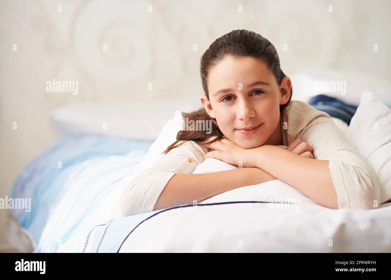 Pretty girls lying on bed hi-res stock photography and images - Alamy