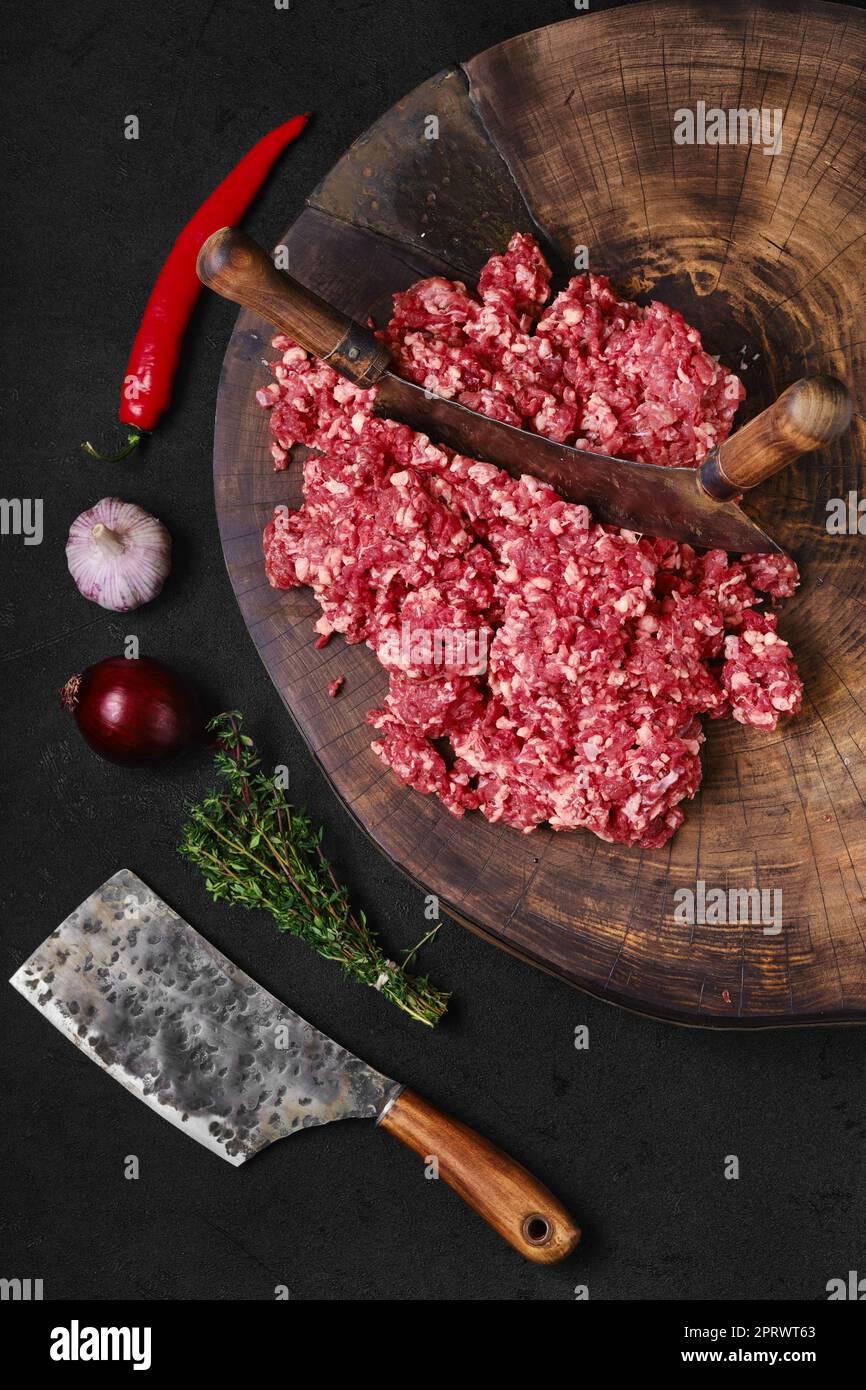 Overhead view of fresh homemade beef minced meat Stock Photo - Alamy