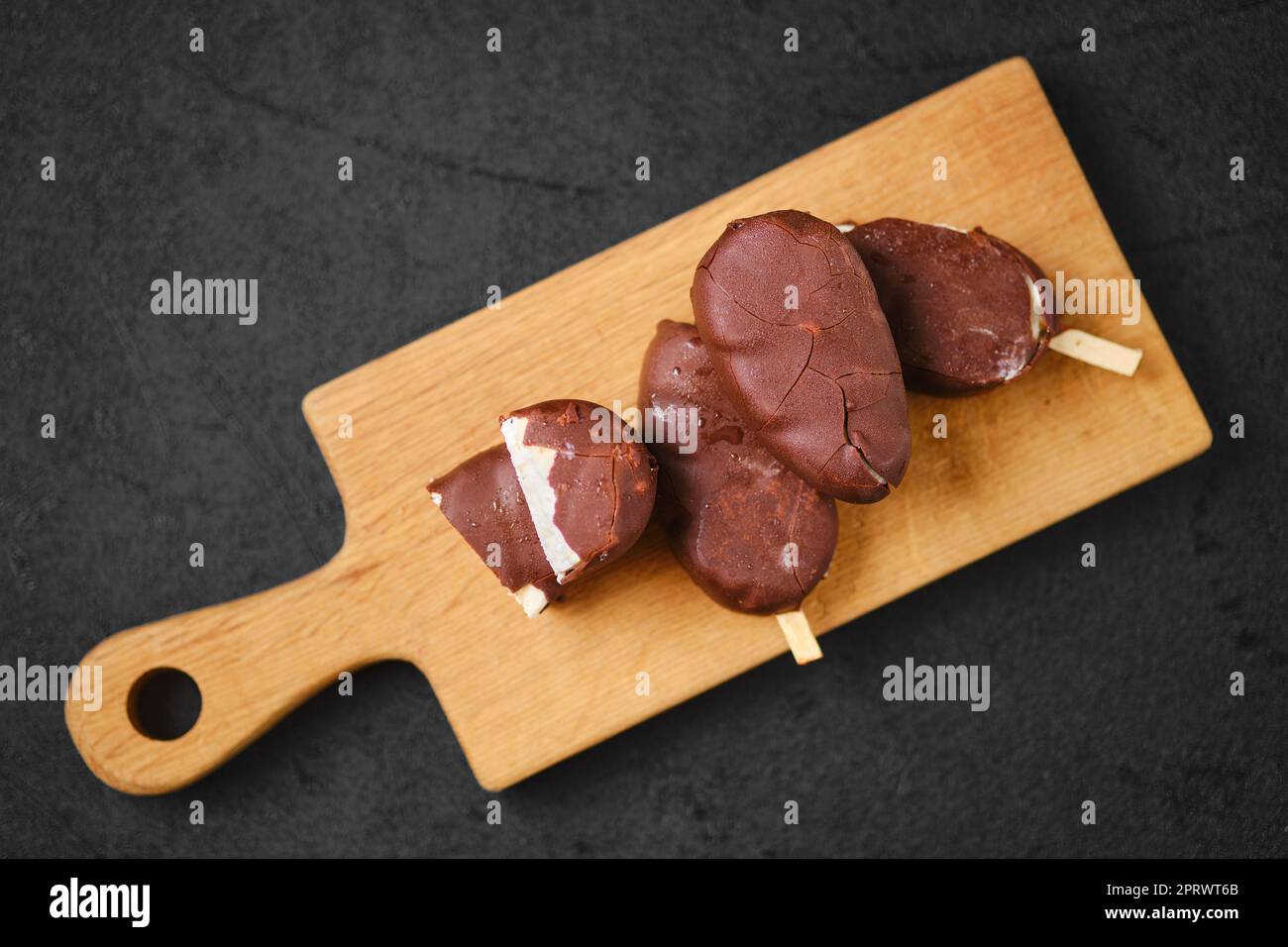 Overhead view of homemade curd bars in chocolate Stock Photo - Alamy