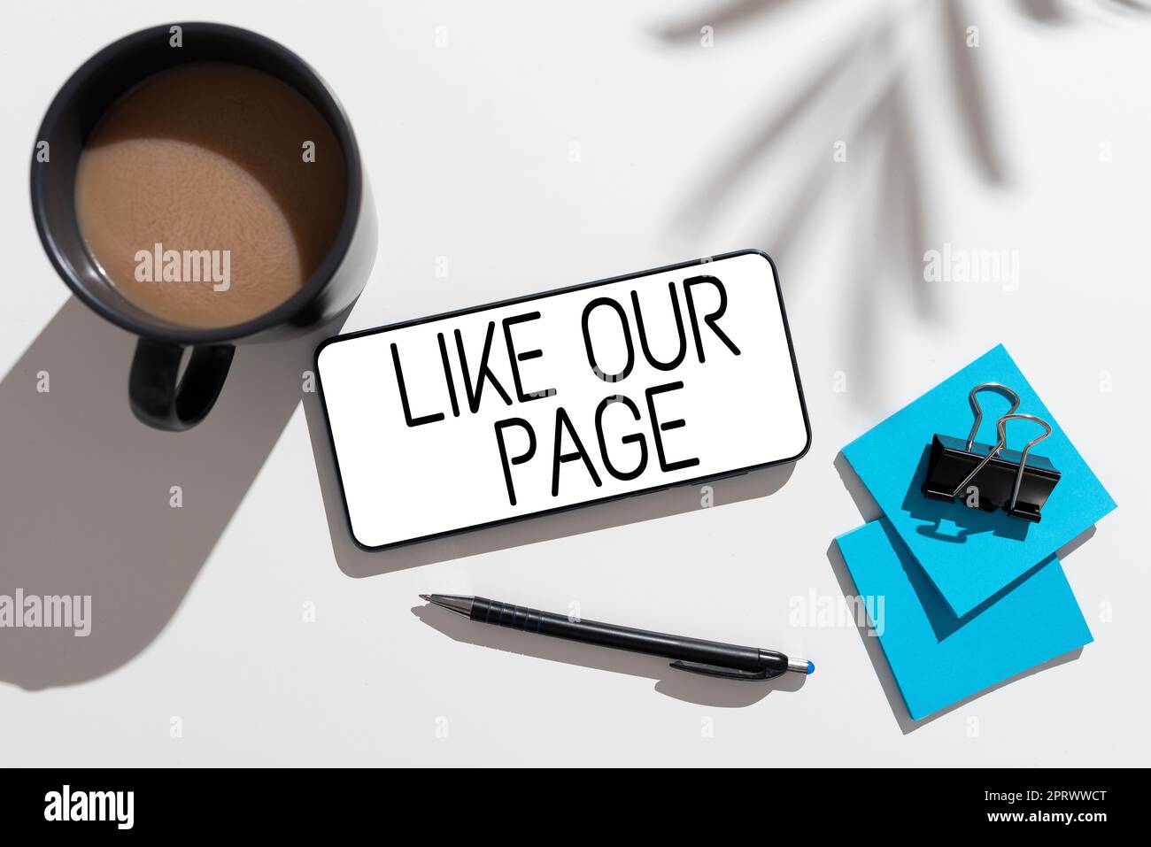 Hand writing sign Like Our Page. Word for Follow us on the internet ...