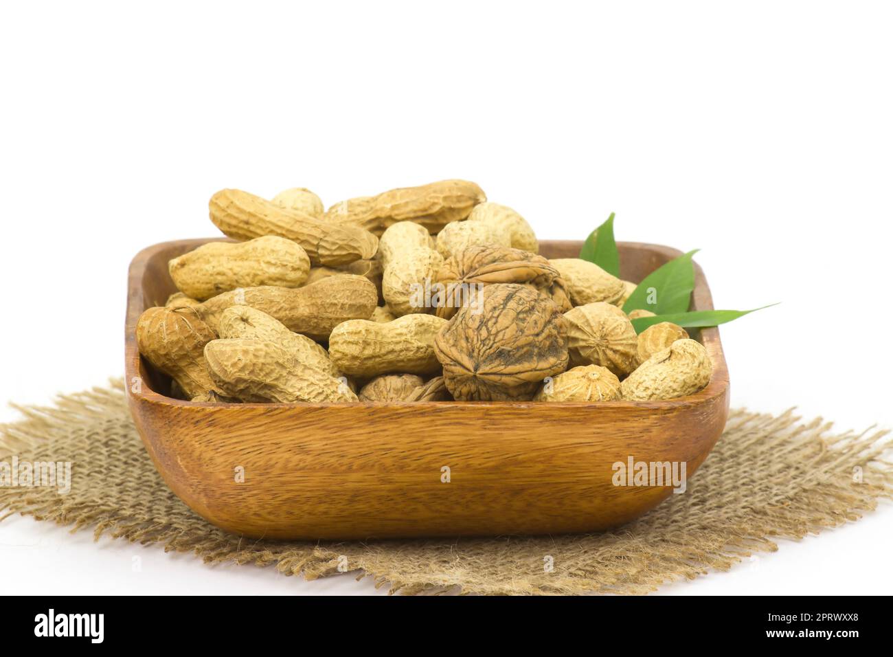 Ripe walnuts in husks hi-res stock photography and images - Alamy