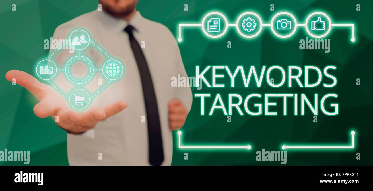 Hand writing sign Keywords TargetingUse Relevant Words to get High ...