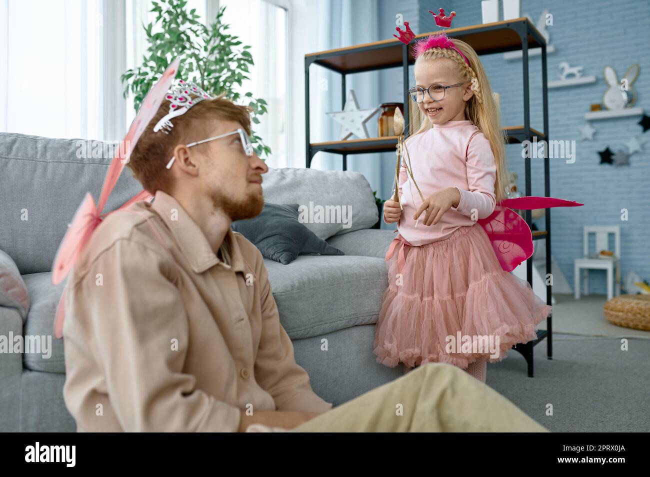 Happy loving young dad play with excited little daughter Stock Photo ...