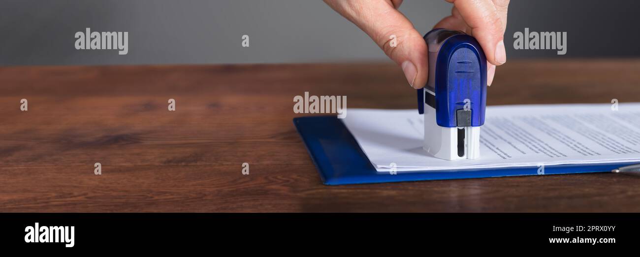 Person stamping hi-res stock photography and images - Alamy