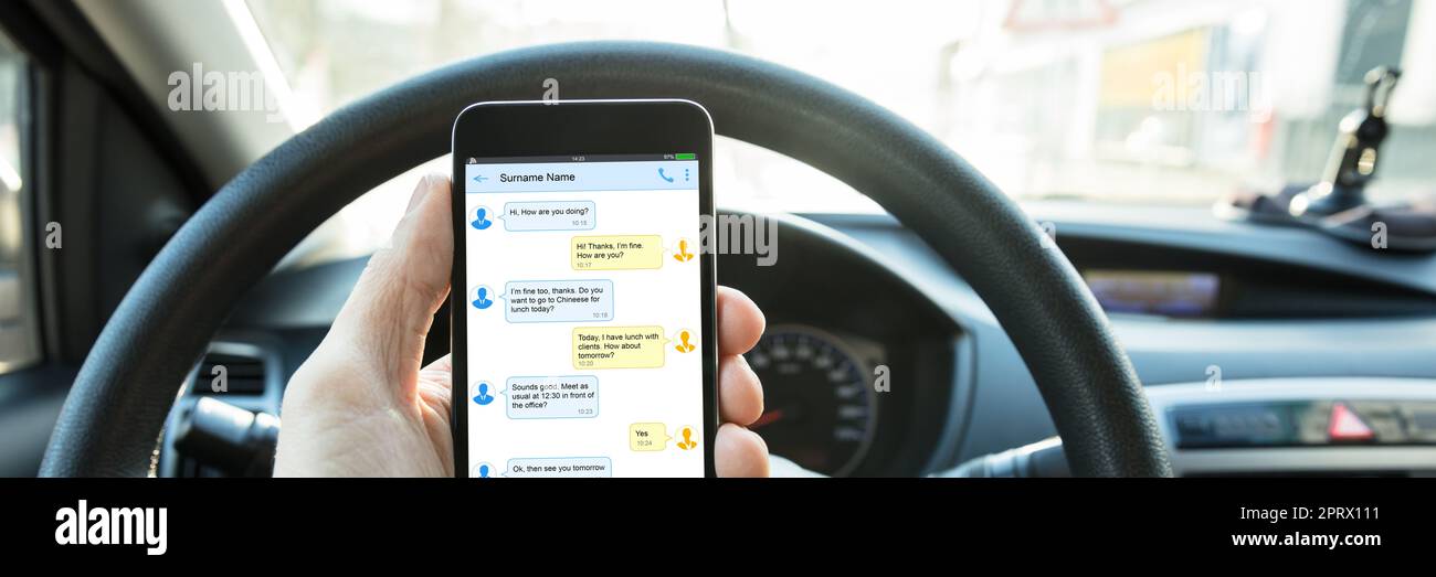 Person Sending Text Message In The Car Stock Photo - Alamy
