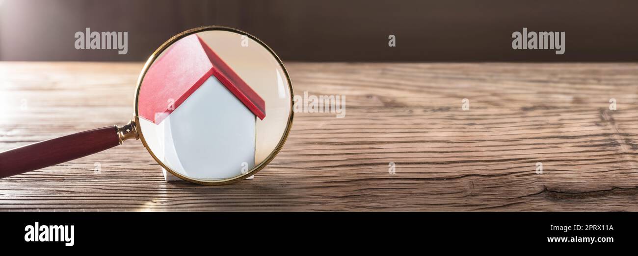House Investigation Using Magnifying Glass Stock Photo - Alamy