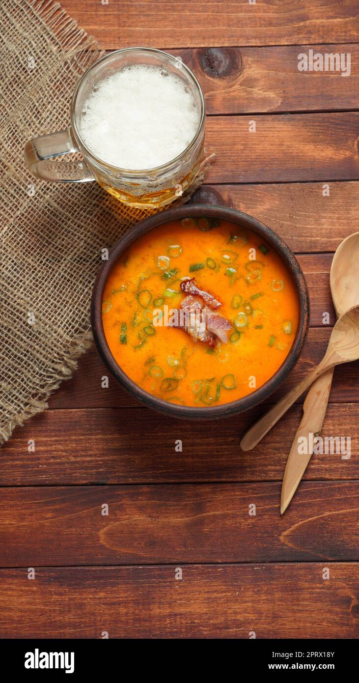 German Beer Cheese soup with the cheddar and fried bacon. Oktoberfest ...