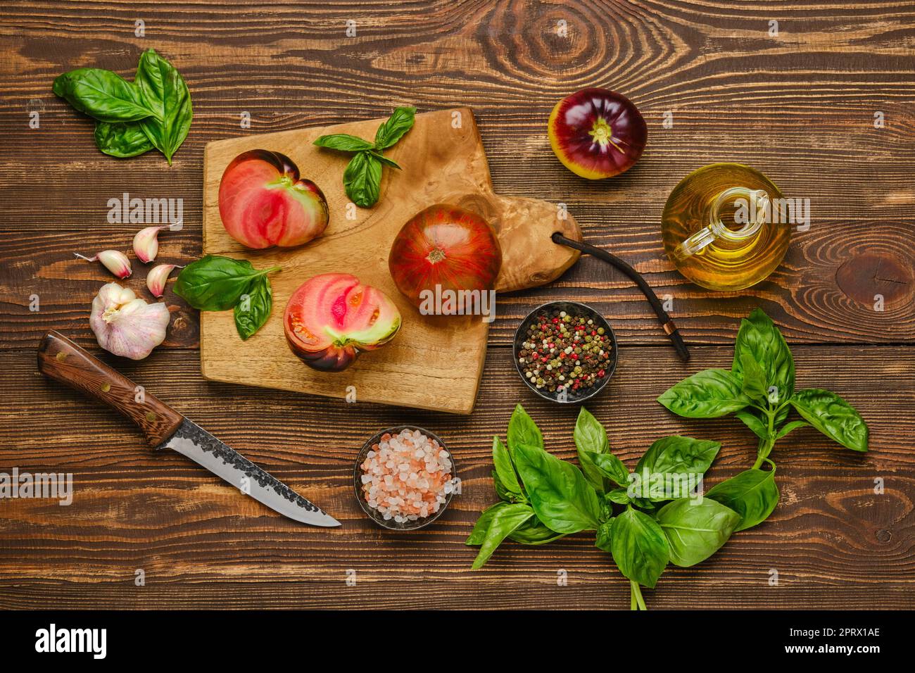 Preparation of spicy tomato salad Stock Photo - Alamy