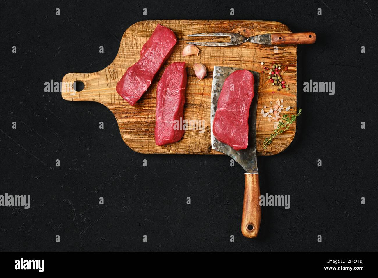 Overhead view of raw boneless strip steak Stock Photo - Alamy
