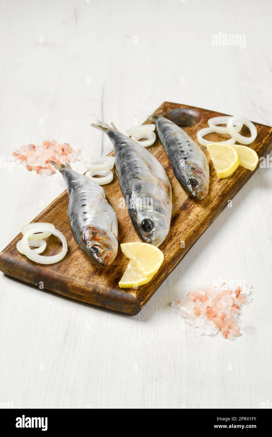 Salted iwashi herring fish marinated in spice Stock Photo - Alamy