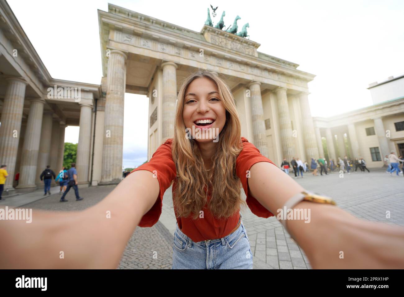 Self portrait of beautiful excited school exchange girl visiting Europe ...