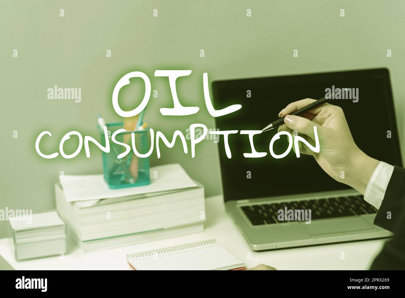 Hand writing sign Oil ConsumptionThis entry is the total oil consumed ...