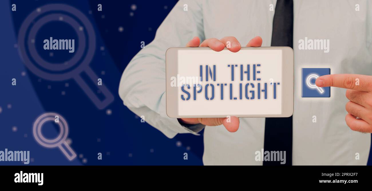 Writing displaying text In The Spotlightwhen crowd concentrating with ...