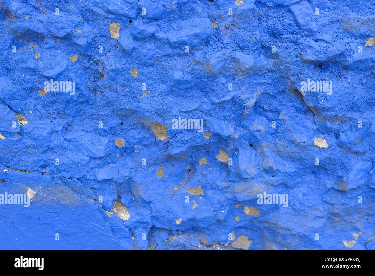 Colorful wall background with damaged paints of blue Stock Photo - Alamy
