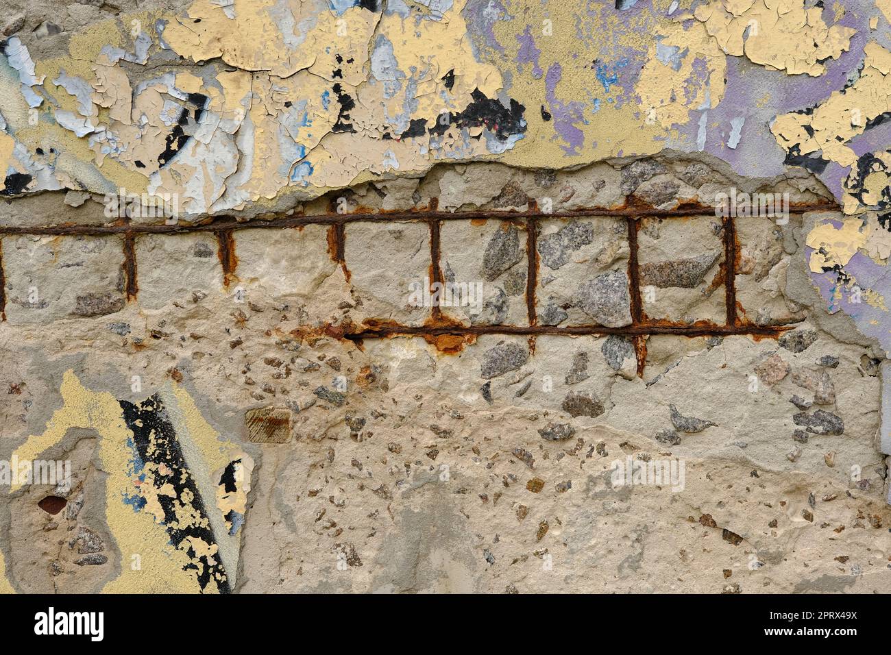 Old reinforced concrete structure with damaged and rusty metallic ...