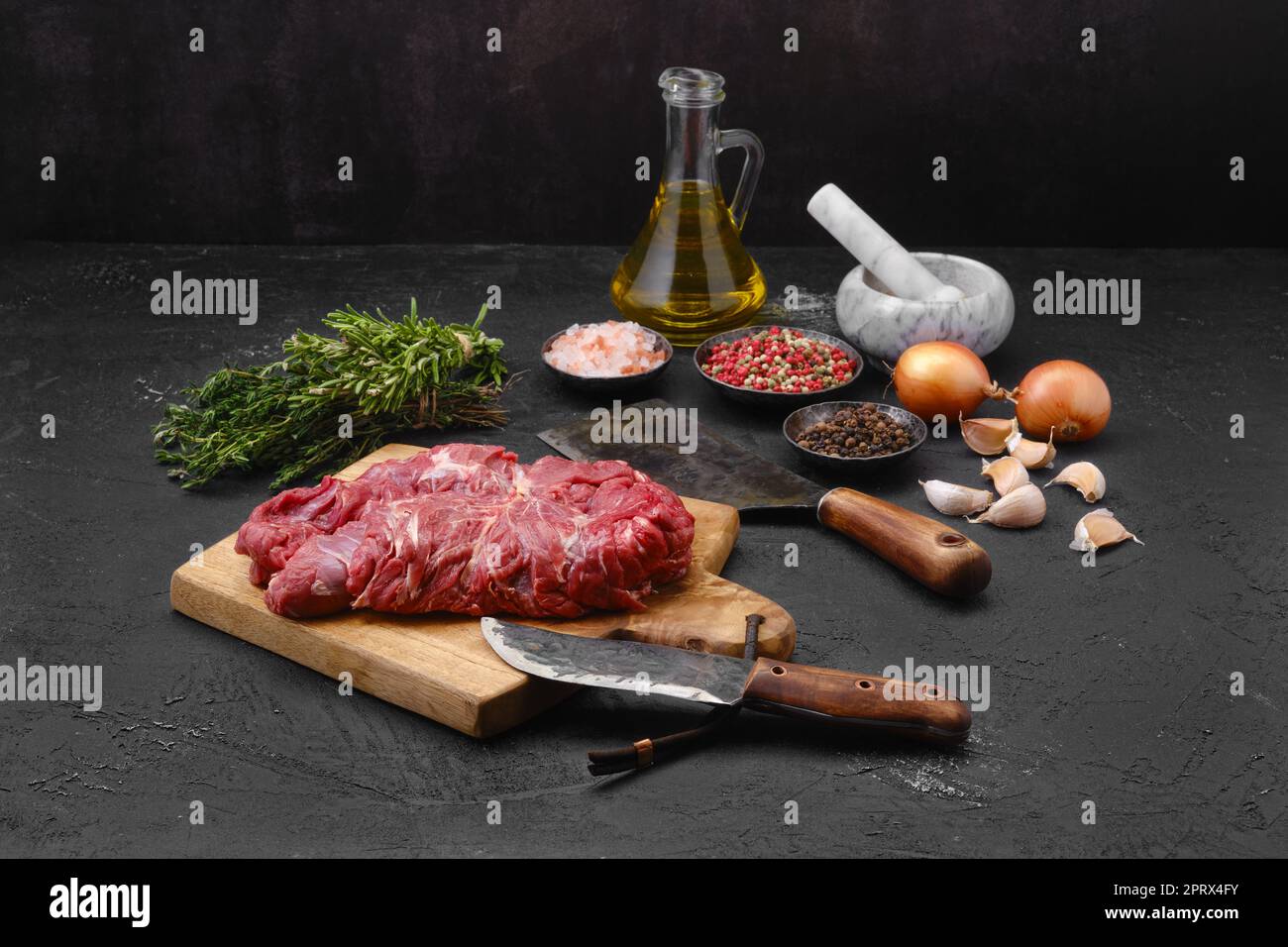 Raw lamb boneless neck meat on cutting board Stock Photo - Alamy